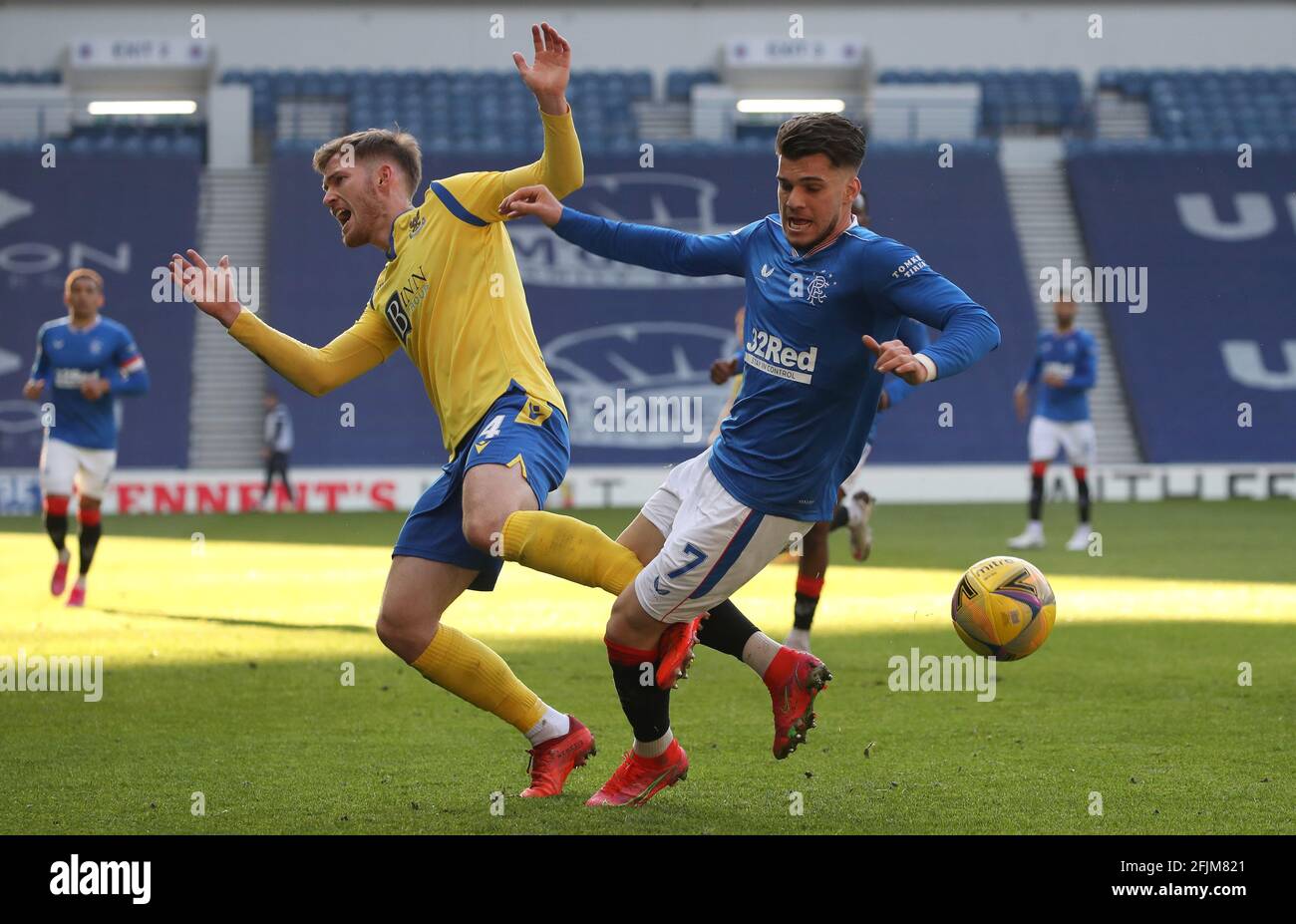 St Johnstone's Jamie McCart (left) and Rangers' Ianis Hagi battle for ...