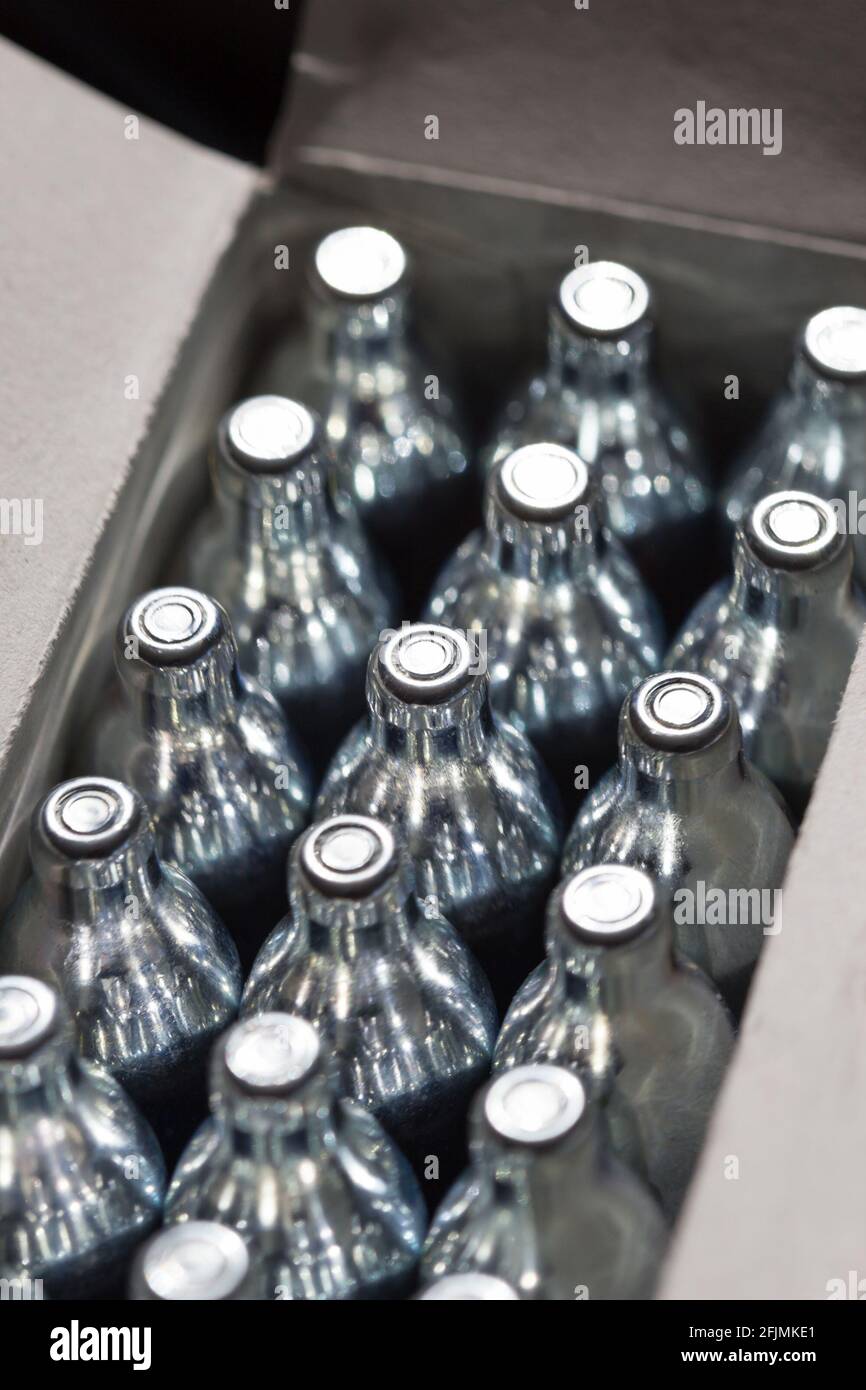 Soda chargers background Stock Photo - Alamy