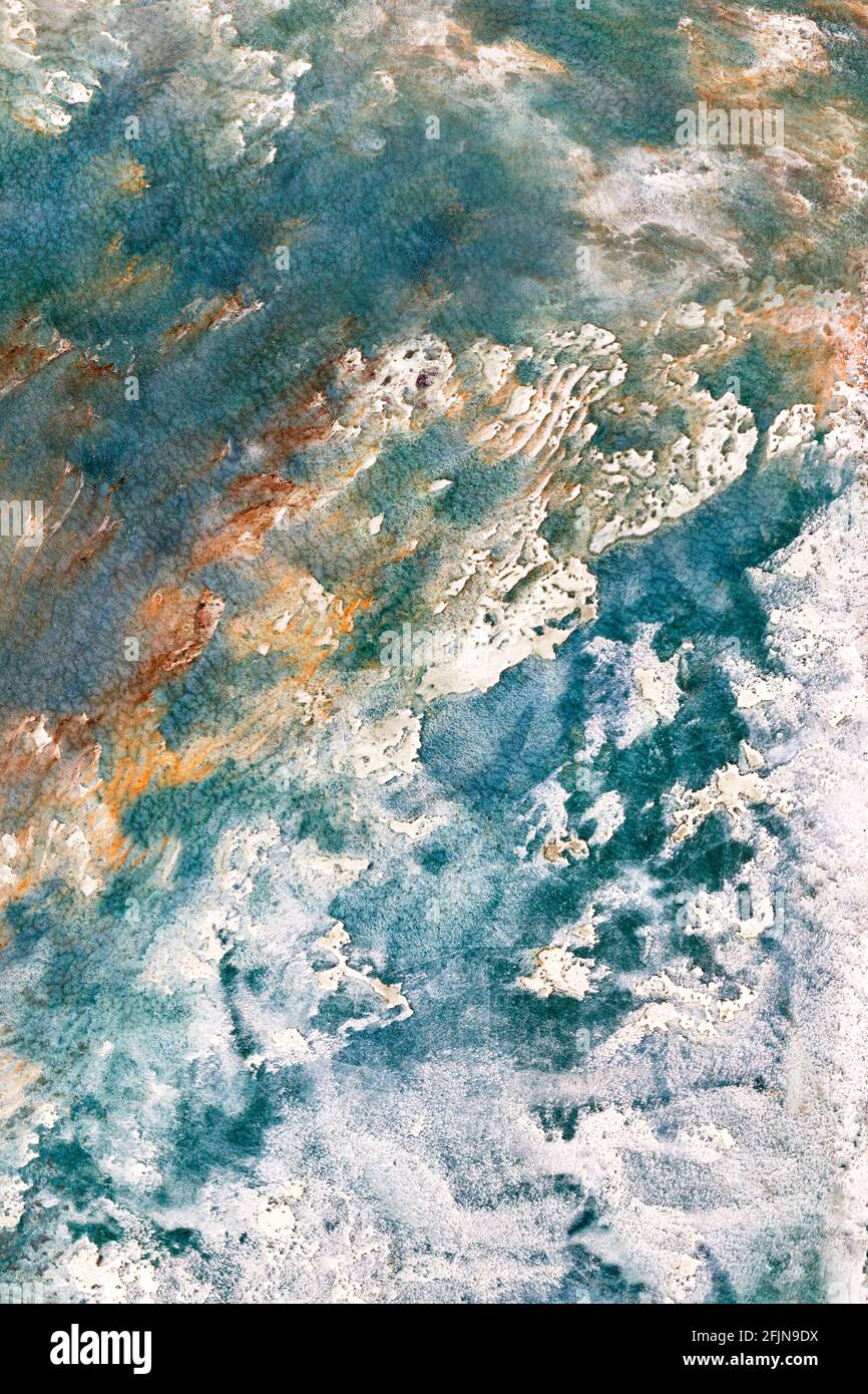 Sea surf with diagonal waves on an abstract plaster textured drawing in ...