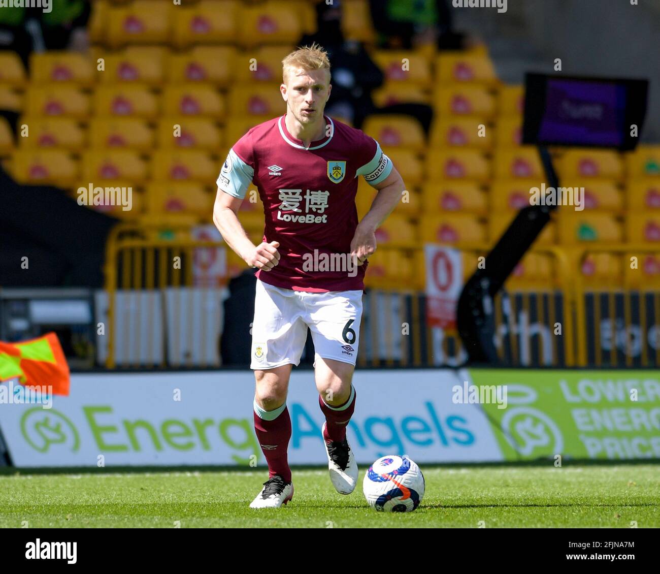 Wolverhampton, UK. 25th Apr, 2021. Ben Mee #6 of Burnley with the ball ...