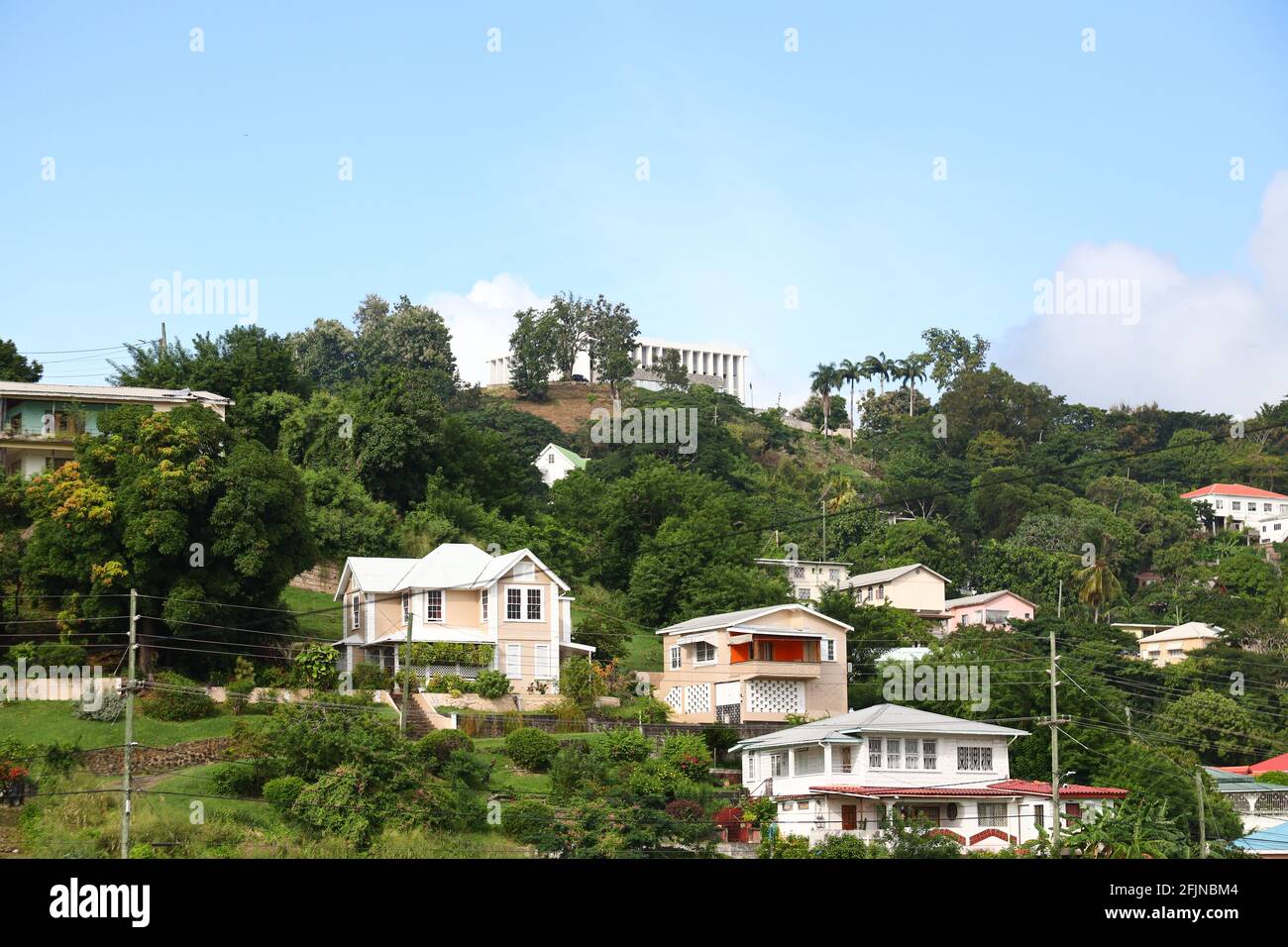 Parliament Building among hillside residences of St Georges Port Town ...