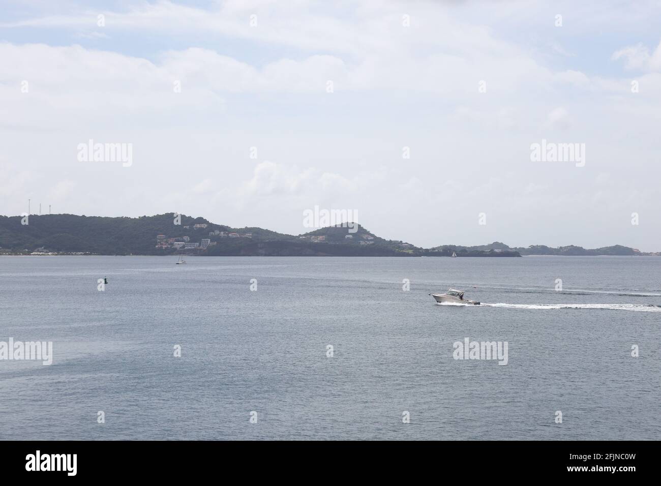Speed boat on the Caribbean Sea in St. George's Harbour on the ...