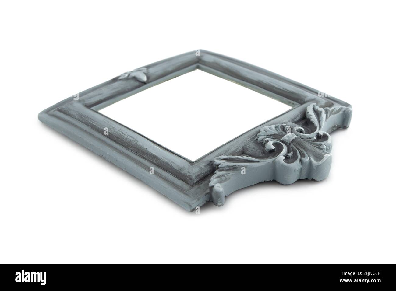 Studio shot of a baroque style photo frame, isolated on white ...