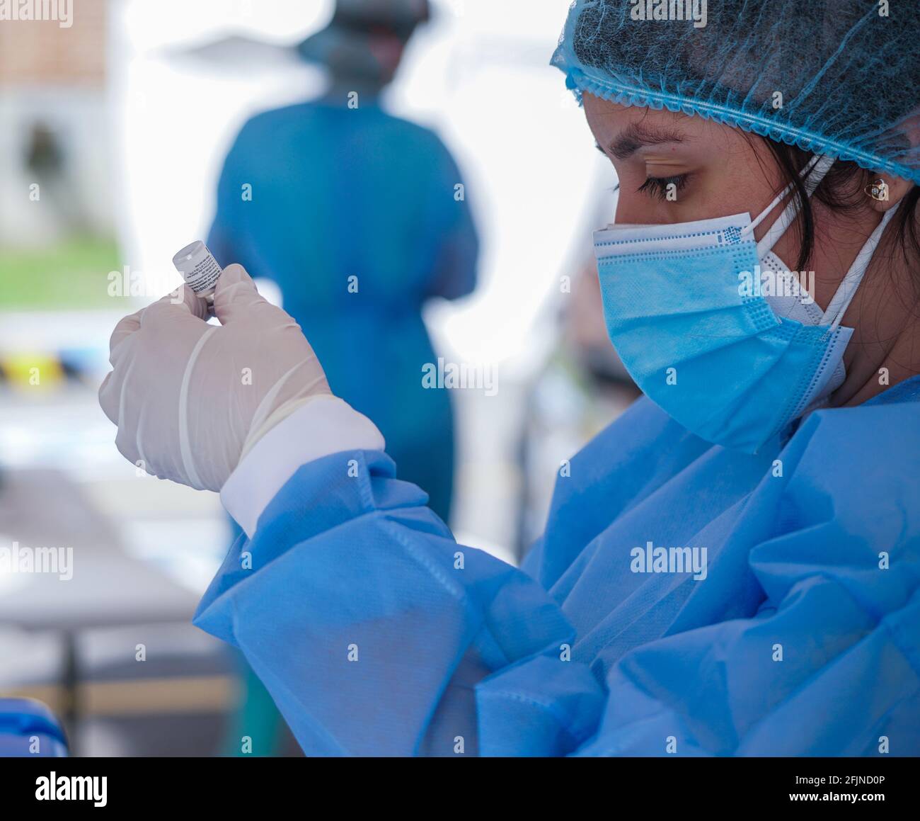 Bogota, Colombia. 25th Apr, 2021. Health personnel prepare the dose of ...
