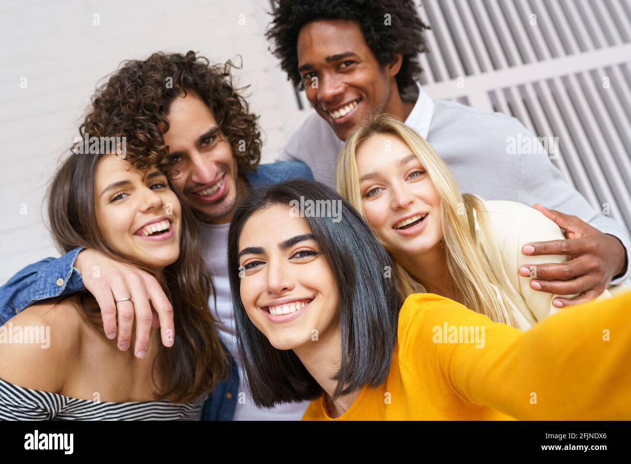 Multi Ethnic Group Of Friends Taking A Selfie Together While Having Fun