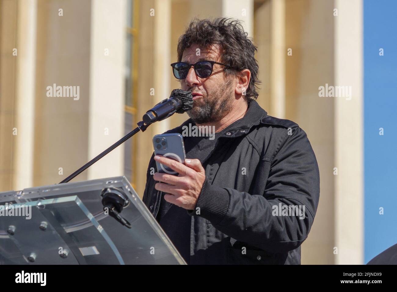 French singer Patrick Bruel as people gather to ask justice for late ...