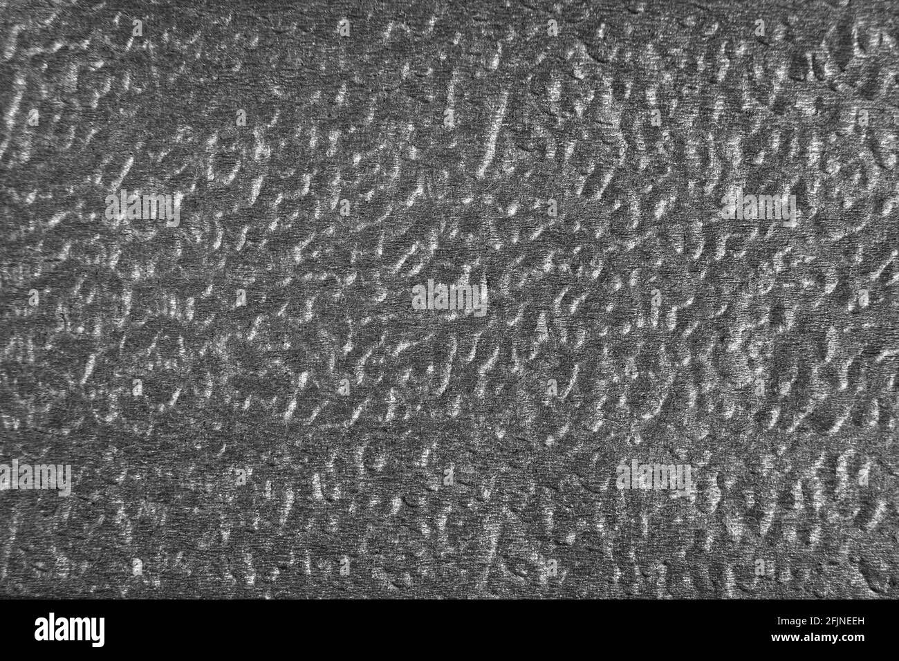 Black perforated paper texture background. Black matte paper pattern ...