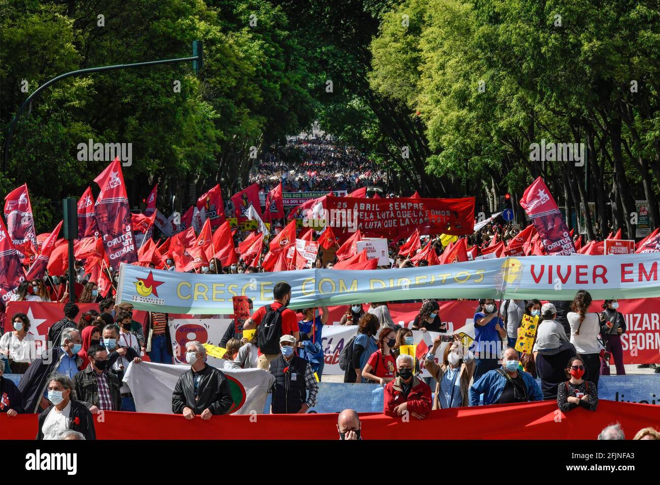 Lisbon, Portugal. 25th Apr, 2021. Crowd of participants parading during ...