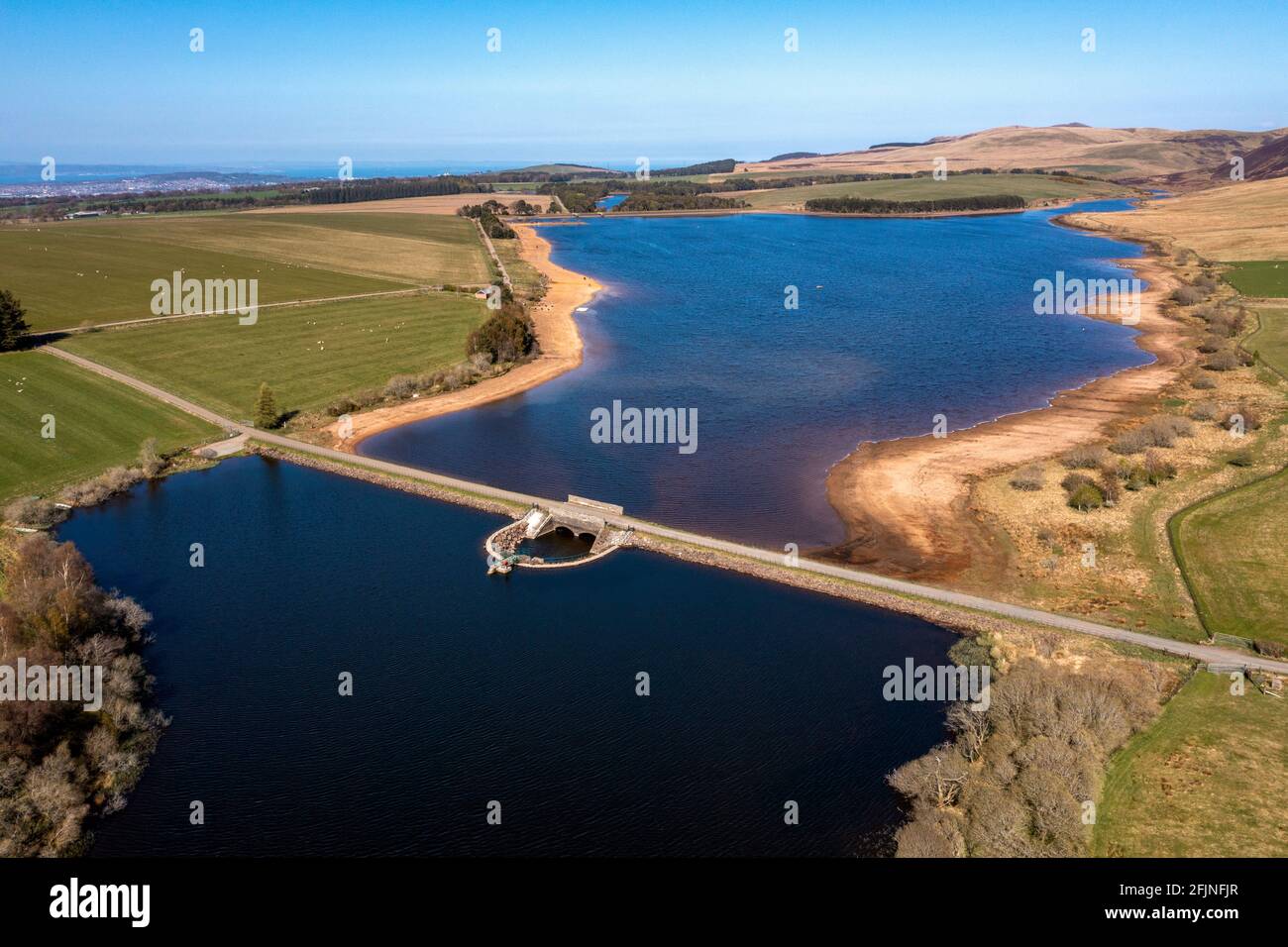 Aerial view of Threipmuir Reservoir located in the Pentland Hills ...