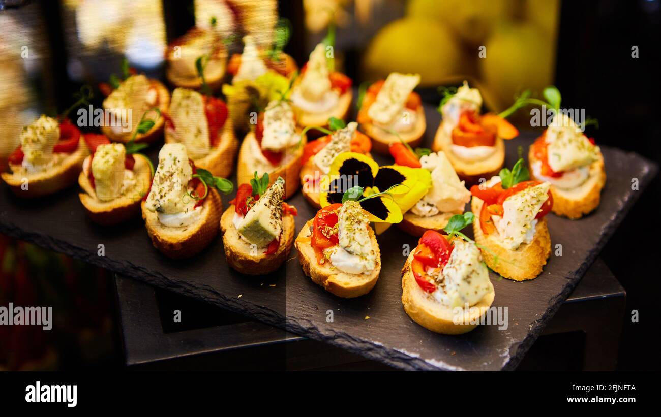Different snacks and appetizers ready for a cocktail party. Catering ...