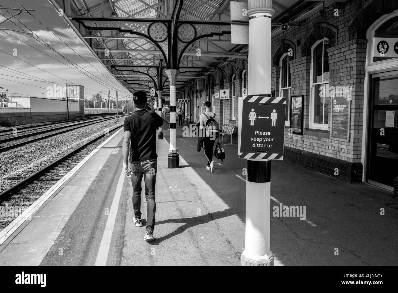 Covid 19 safety sign at Retford station the Grade II listed building in ...