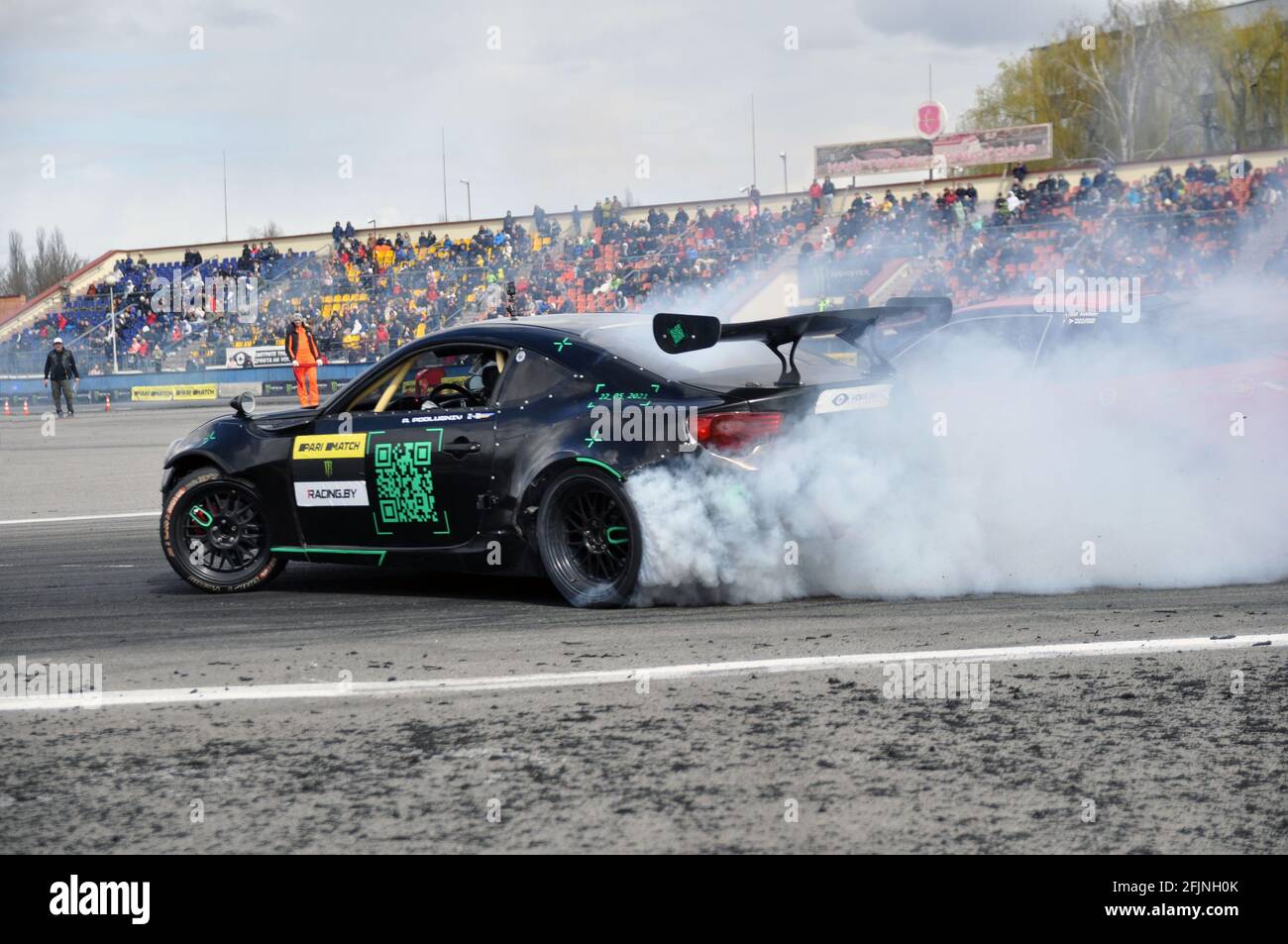 Driving in a car with a controlled skid. Drift Stock Photo - Alamy