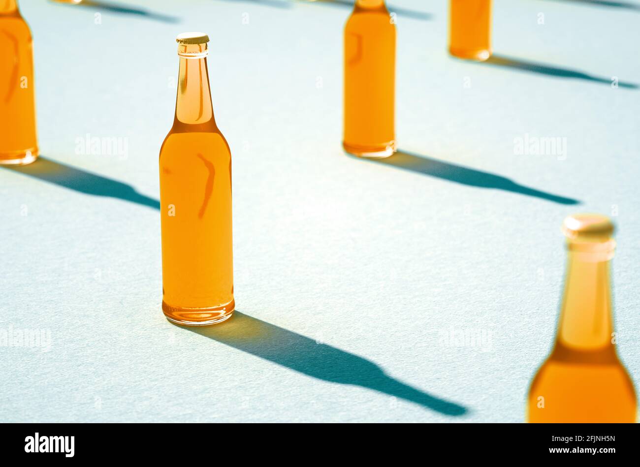 Various glass bottles with shadows on blue background. 3d models of ...