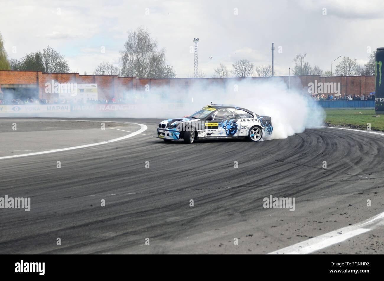 Driving in a car with a controlled skid. Drift Stock Photo - Alamy