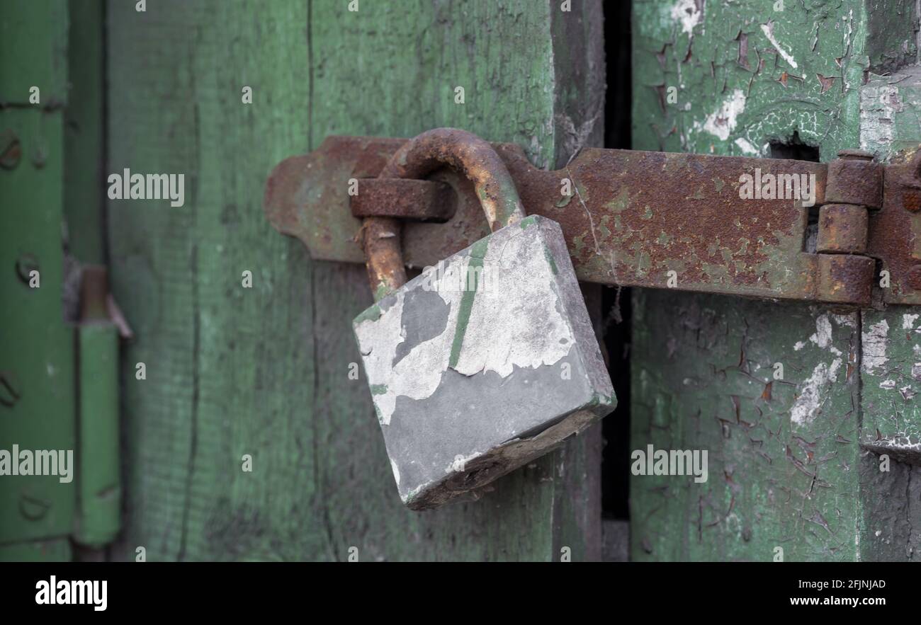 old vintage lock on a wooden door close up Stock Photo - Alamy