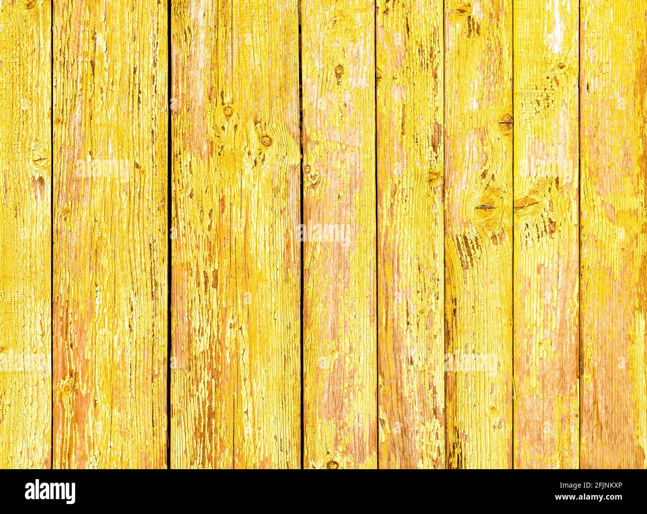 weathered wood plank in the form of a simple peeling yellow paint, old ...