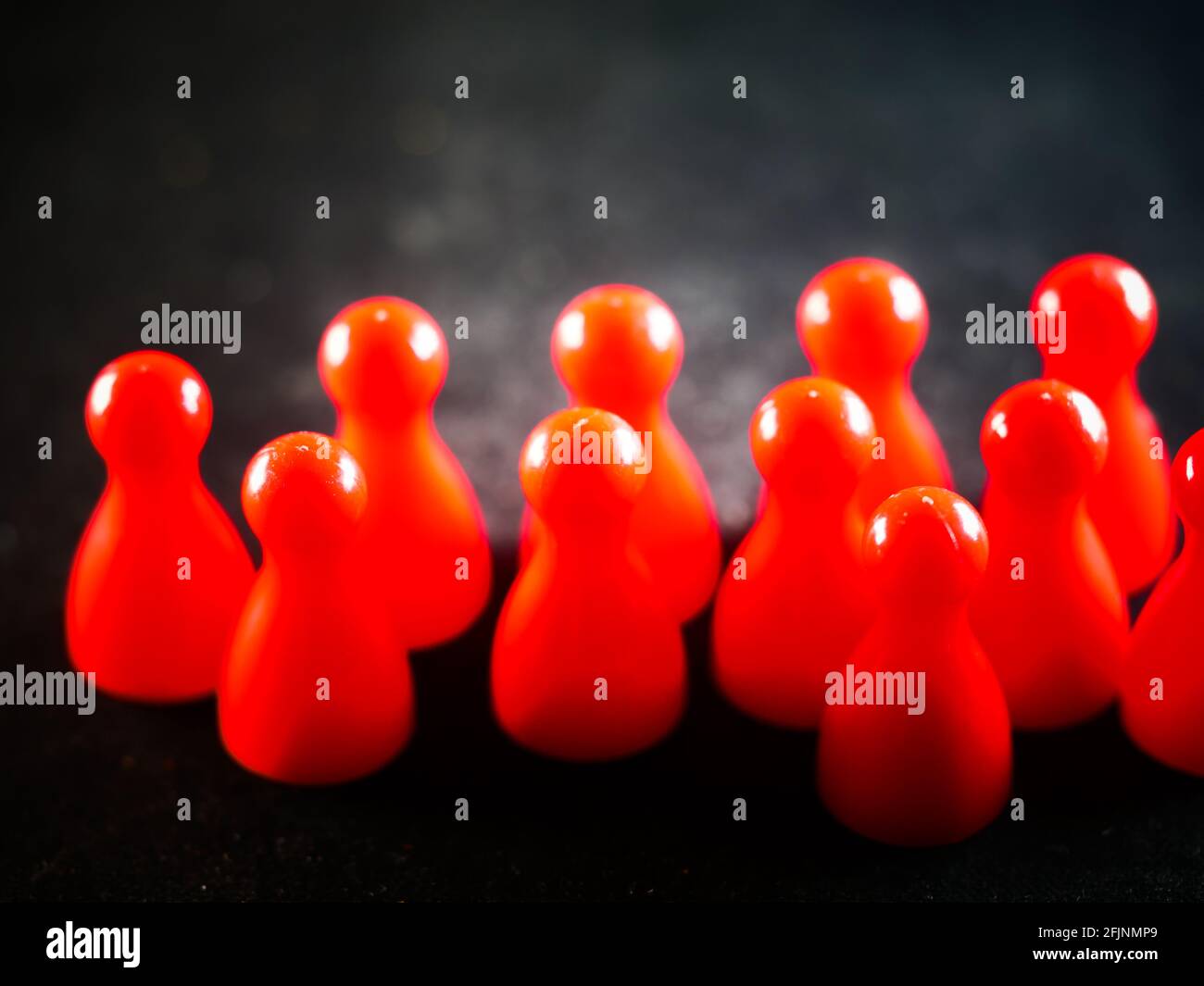 A closeup shot of the orange plastic board game figures Stock Photo - Alamy