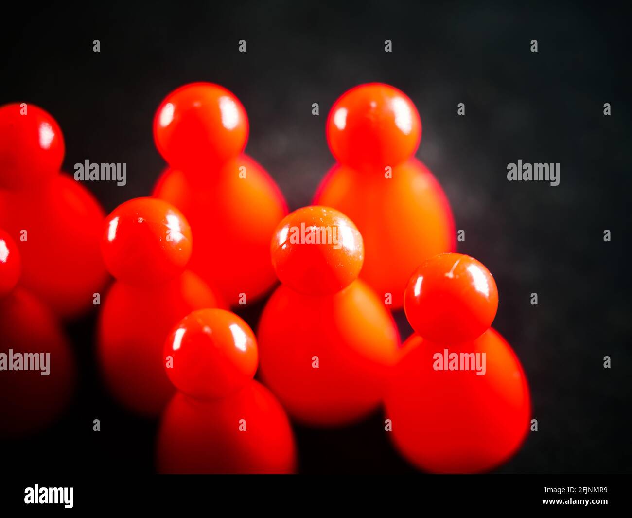 A closeup shot of the orange plastic board game figures Stock Photo - Alamy
