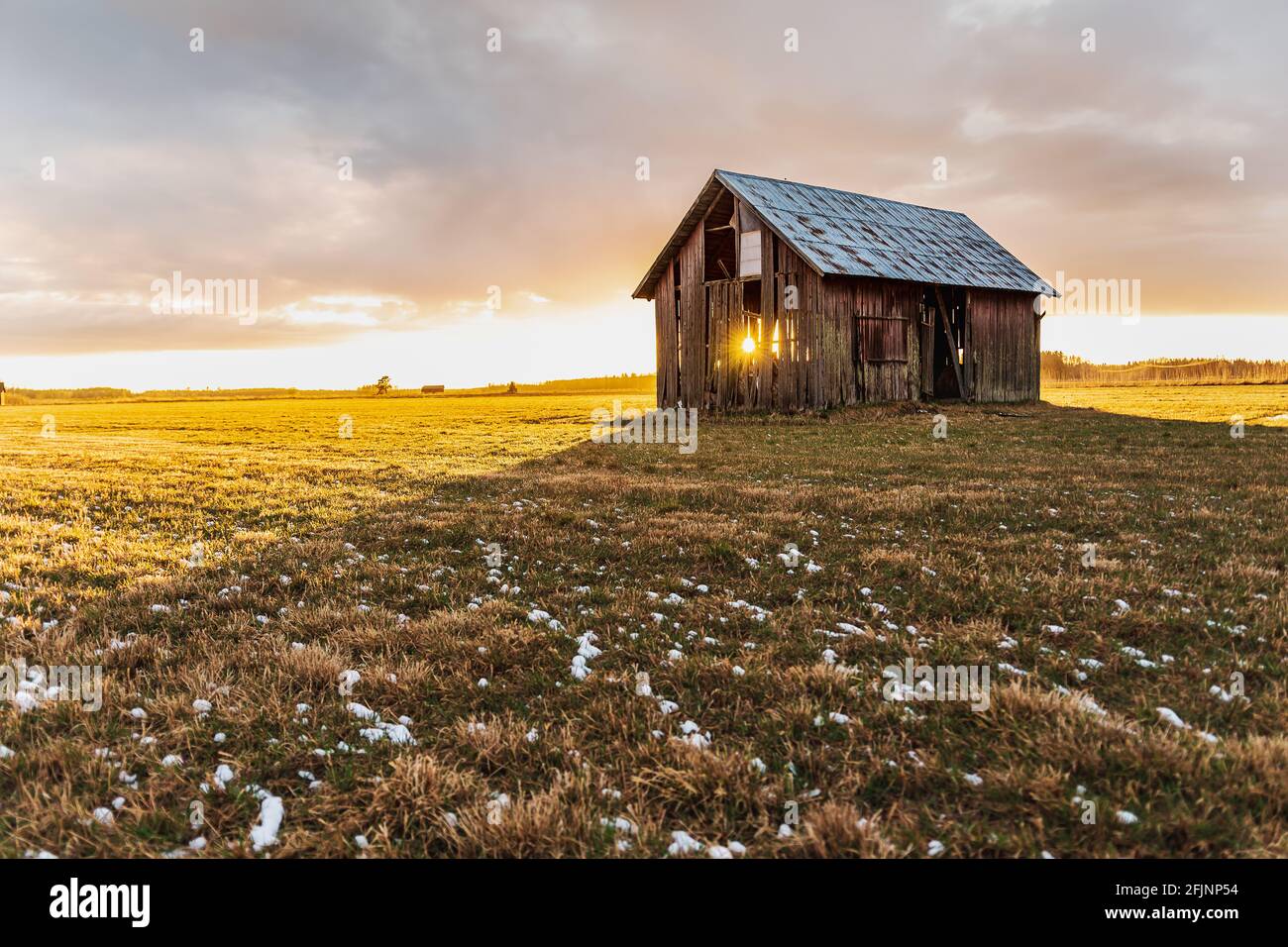 Old barn on arable land in Sweden that keeps falling apart with a ...