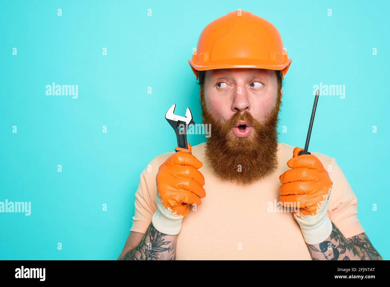Incompetent worker is unsure about his work. cyan background Stock ...
