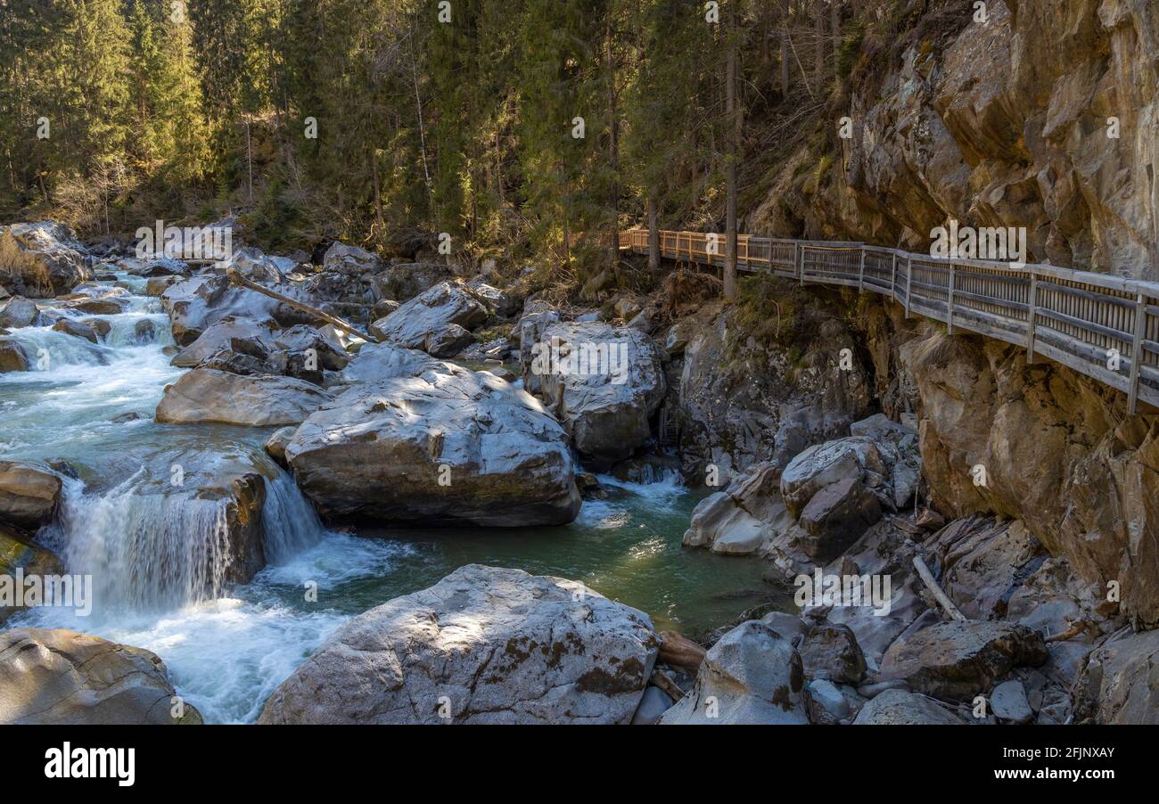 Hiking along the Oetztaler Ache to the Wellerbruecke in the Oetztal ...
