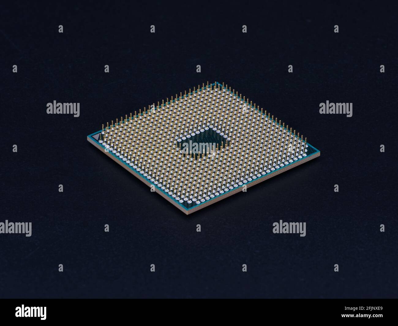 CPU processor chip pin side up isolated on black Stock Photo - Alamy