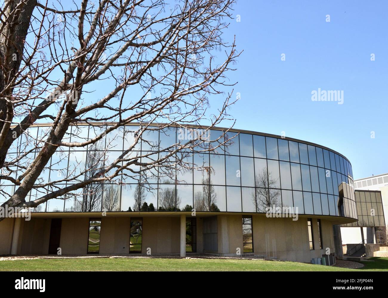 Curved glass building on the campus of Hawkeye Community College ...
