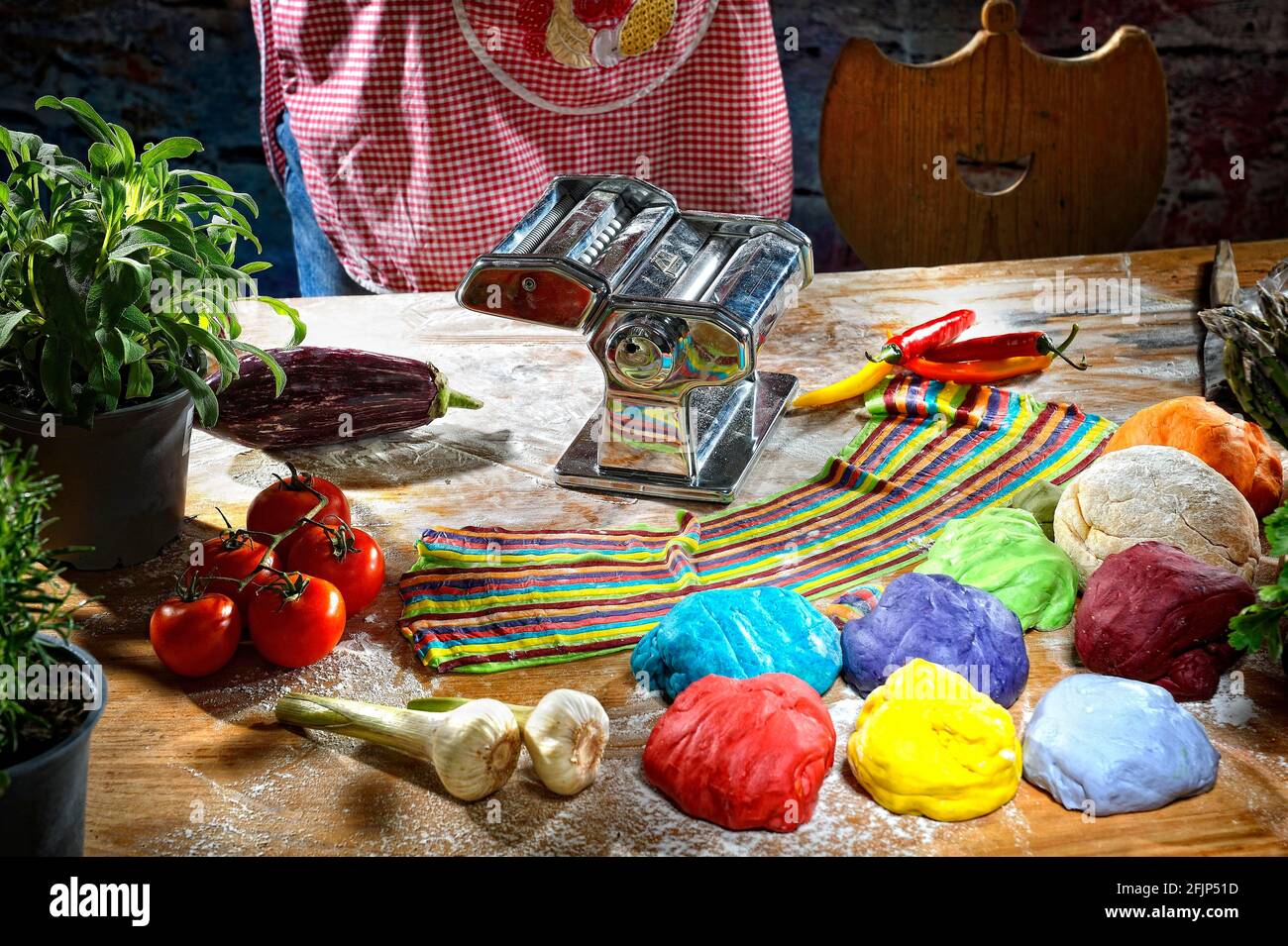 Pasta machine with fresh coloured pasta dough, Germany Stock Photo - Alamy