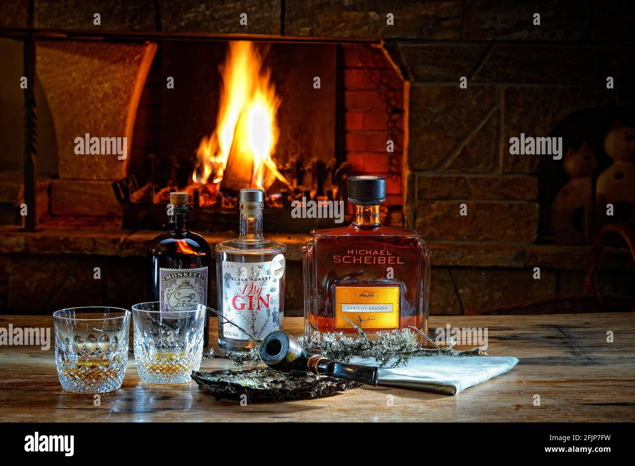 Various spirits with pipe in front of a burning fireplace with fire ...