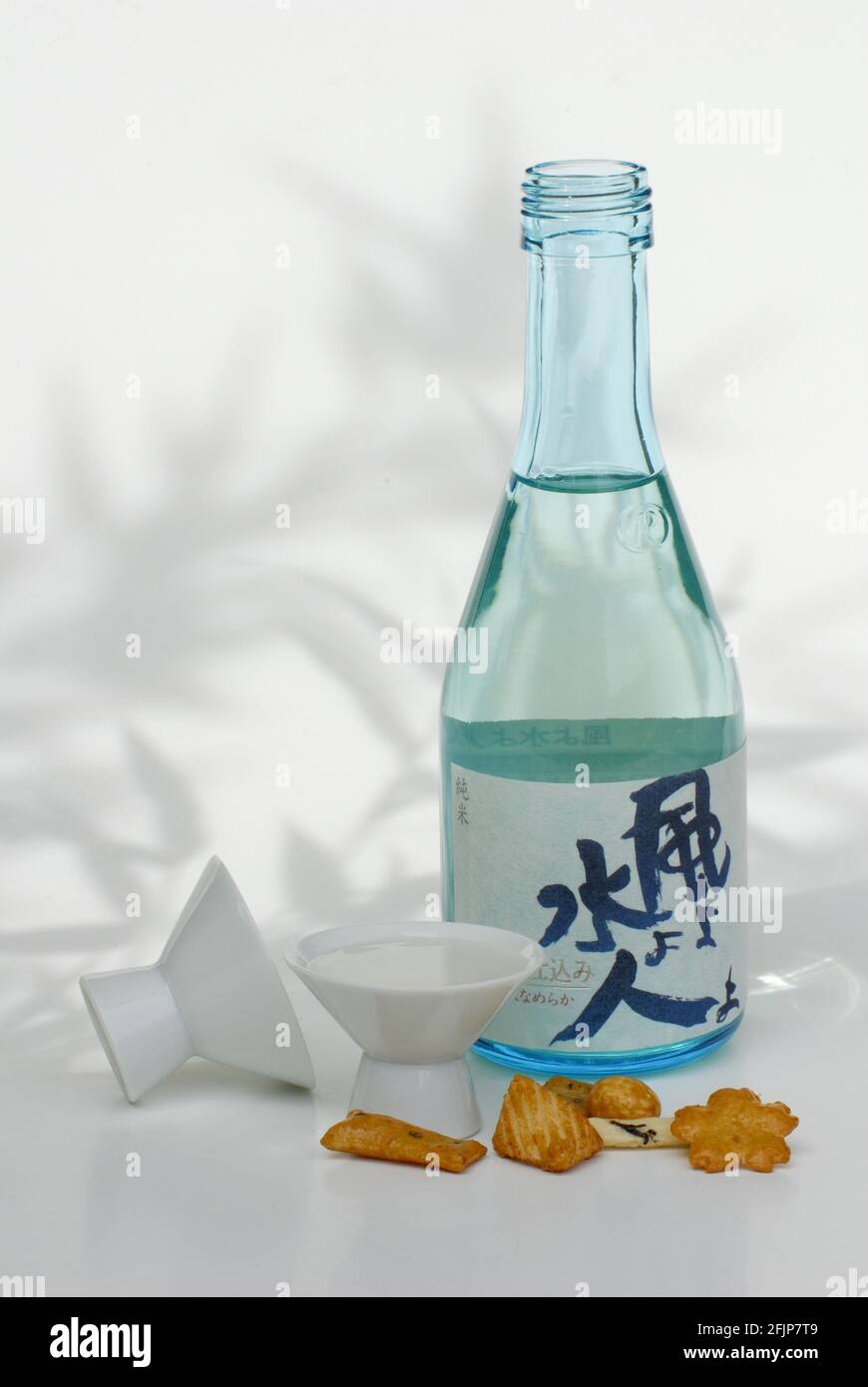Japanese rice wine and rice crackers, sake Stock Photo - Alamy