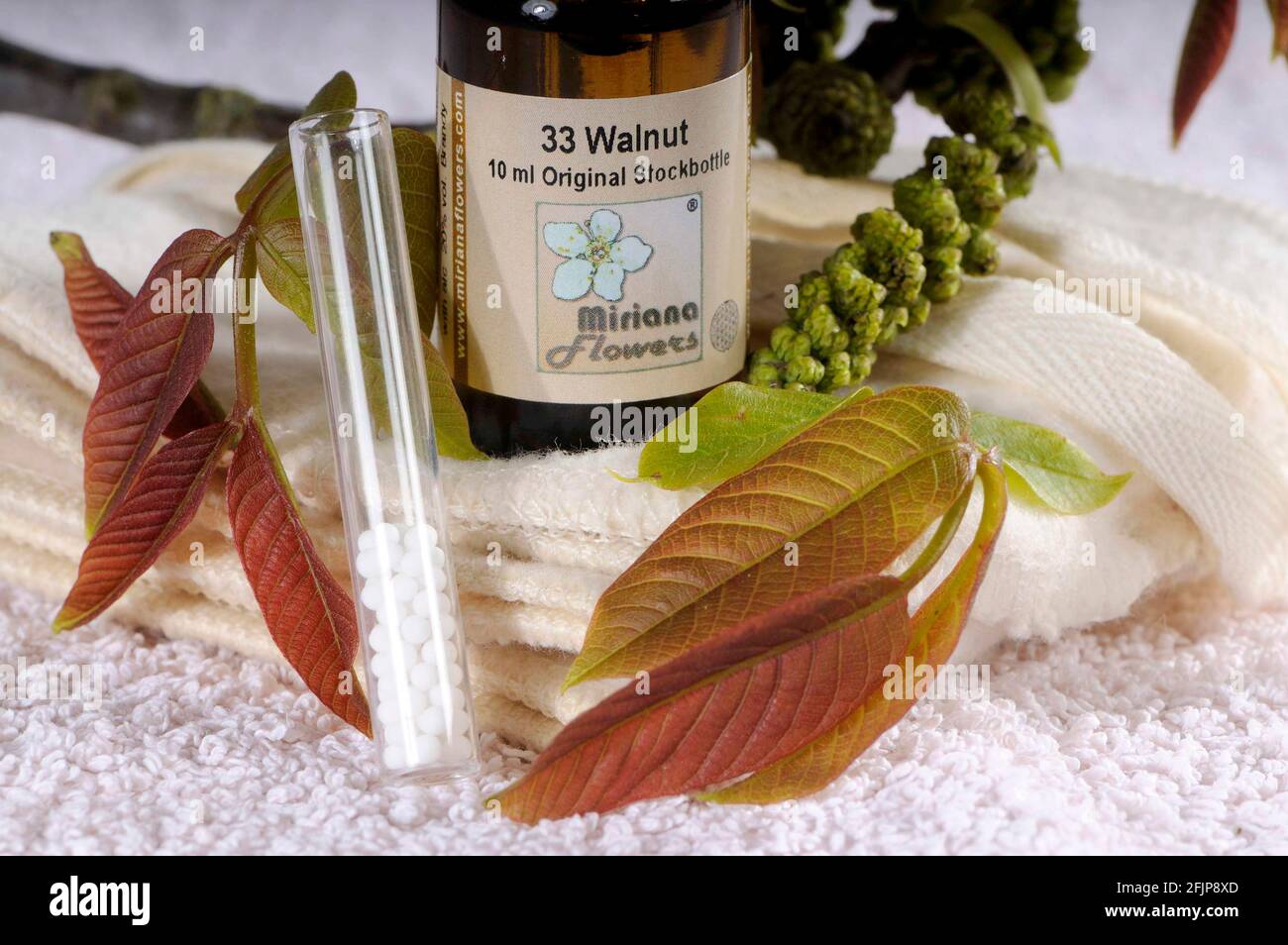 Bottles with Bach flower drops, walnut, and globules (Juglans regia ...