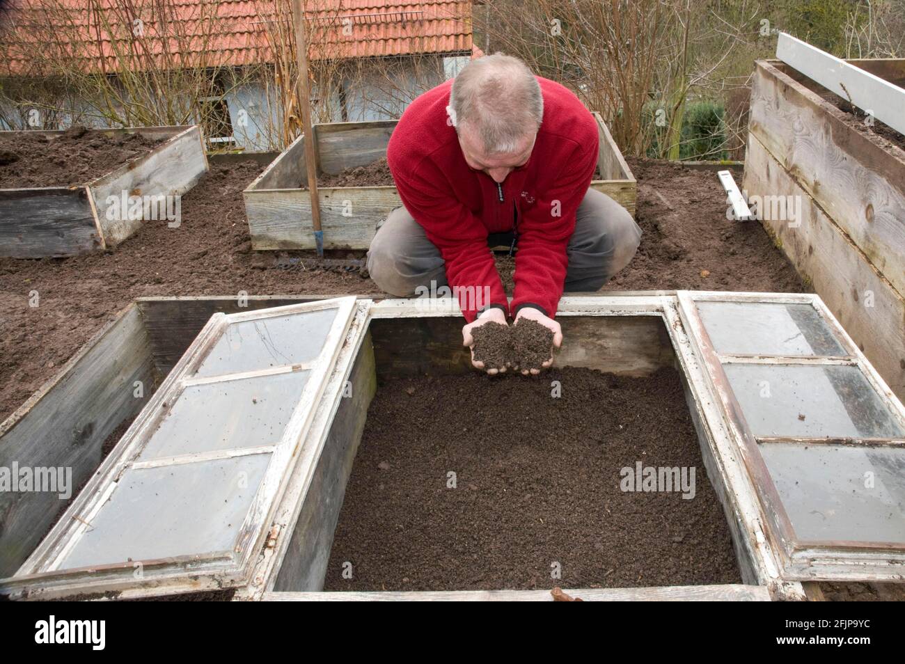 Creation of cold frame, compost, soil Stock Photo - Alamy