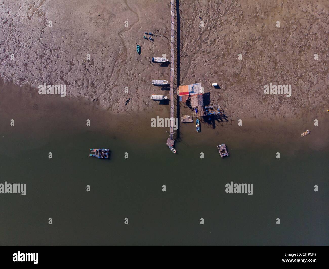 Aerial view from top of estuary where small boats parking at fisherman ...