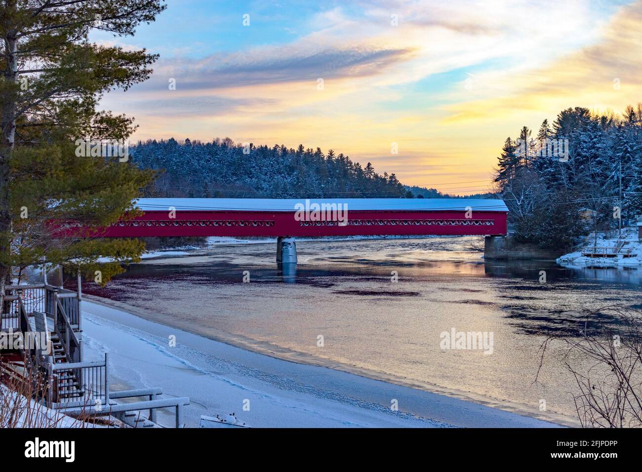 The Historic Wakefield Covered Bridge at sunset in winter Stock Photo ...