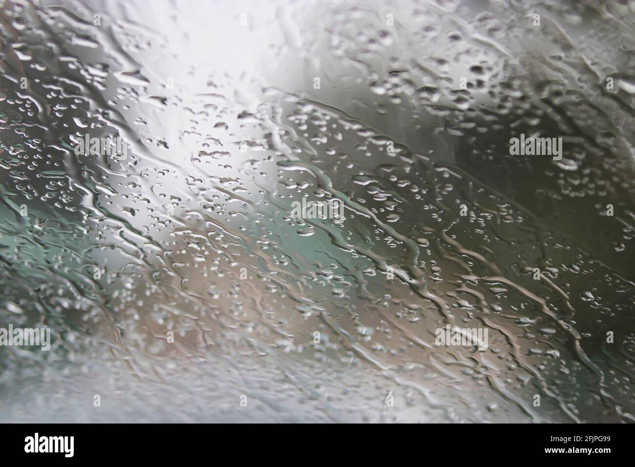 water splashed up on windshield of car in stormy weather Stock Photo ...