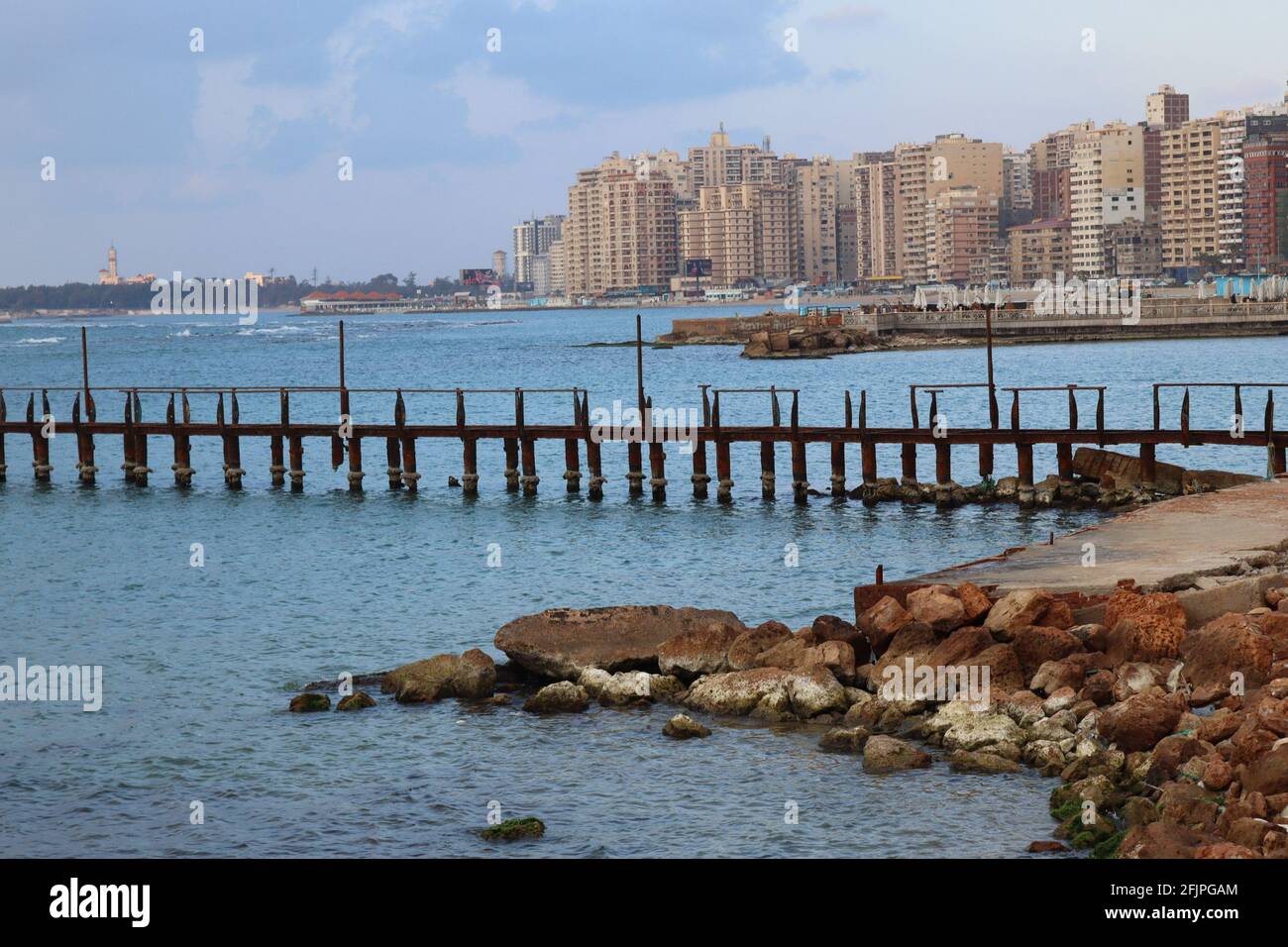 the coast of the sea in city Alexandria Egypt with building and clear ...
