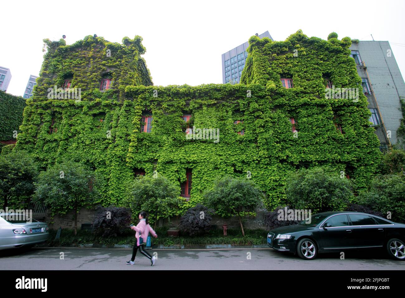 CHENGDU, CHINA - APRIL 20, 2021 - Buildings are surrounded by green ...
