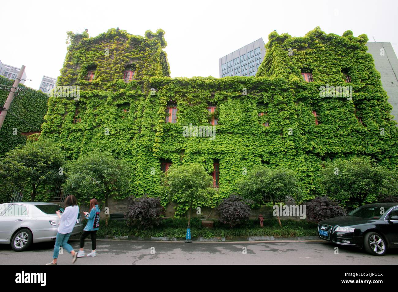 CHENGDU, CHINA - APRIL 20, 2021 - Buildings are surrounded by green ...