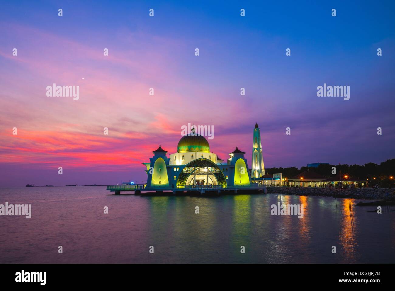 masjid selat melaka, the floating mosque, in malacca, malaysia at dusk ...