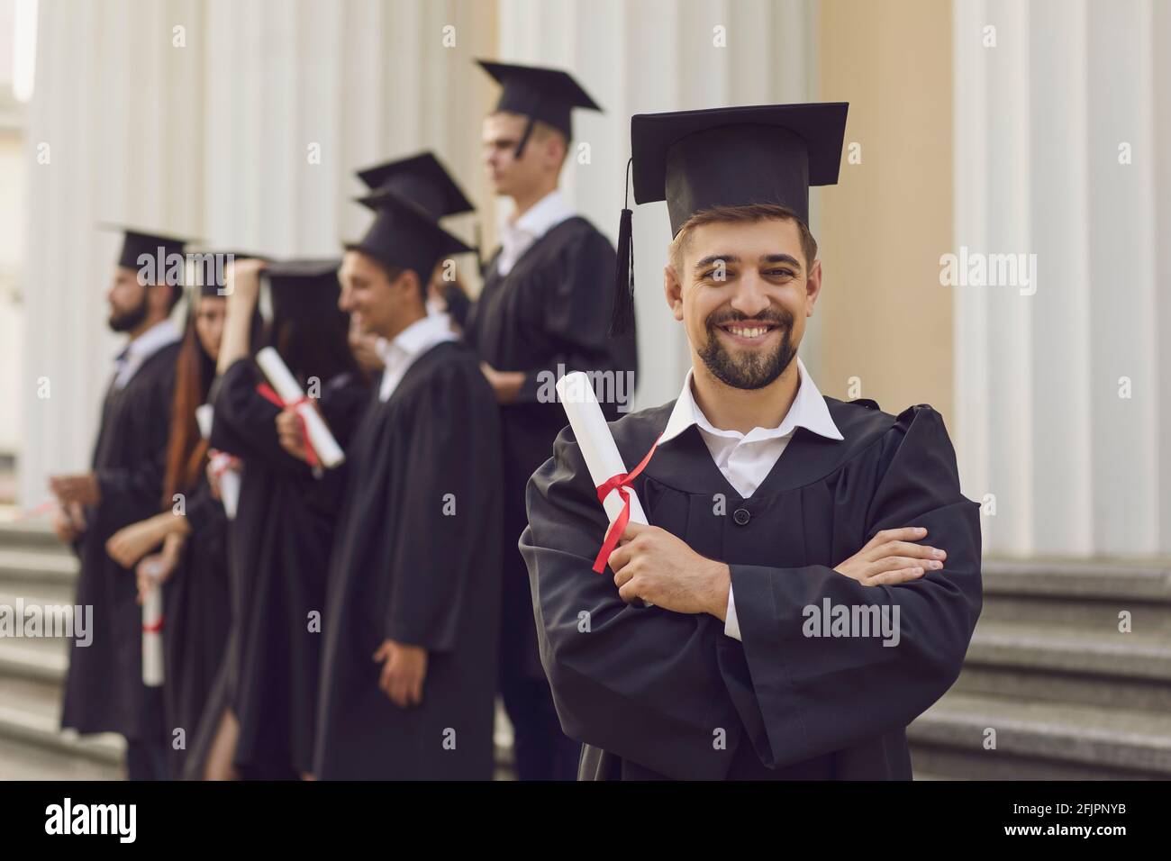 Man holding degree certificate hi-res stock photography and images - Alamy