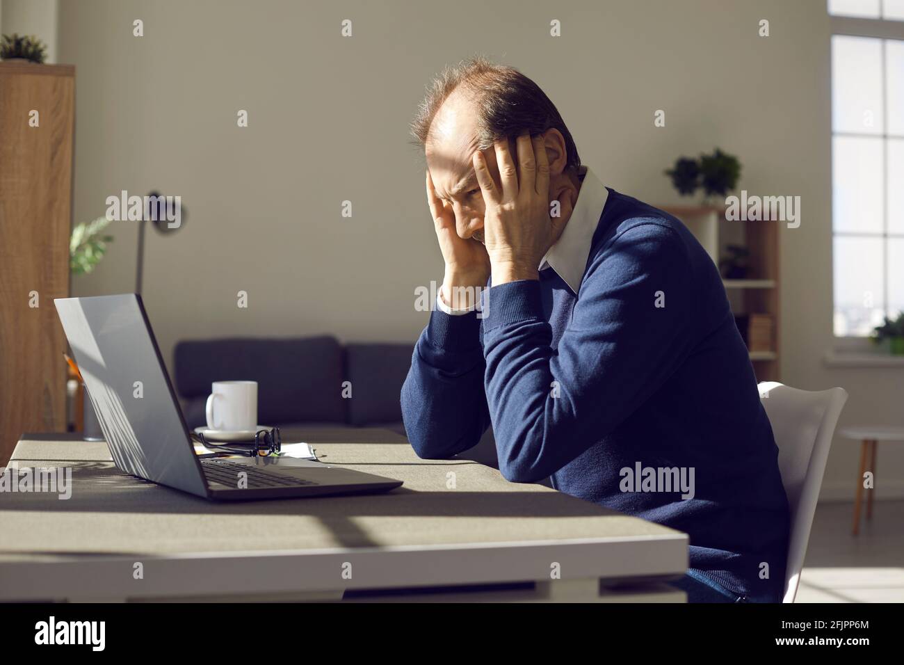 Stressed middle aged man hi-res stock photography and images - Alamy