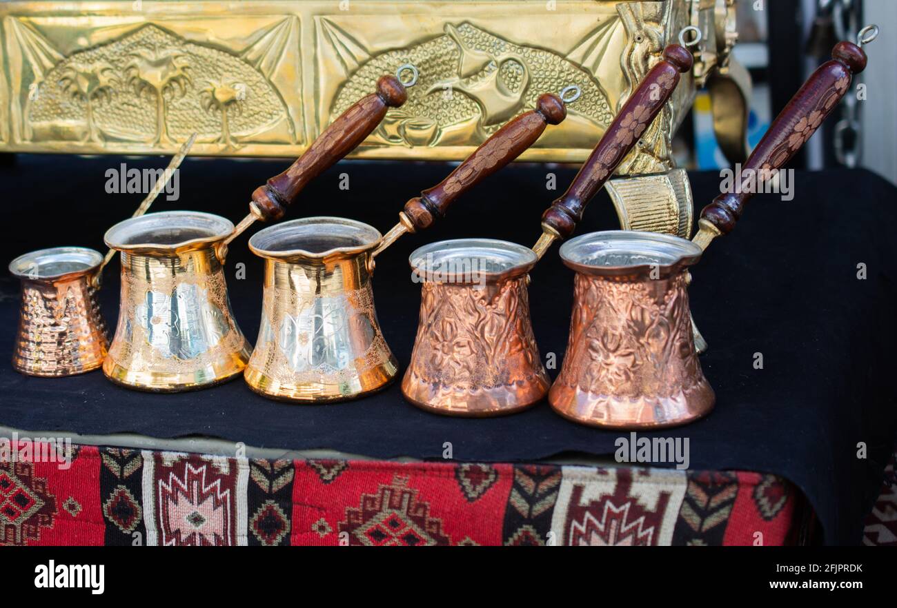 Turkish coffee pots made of metal in a traditional style Stock Photo ...