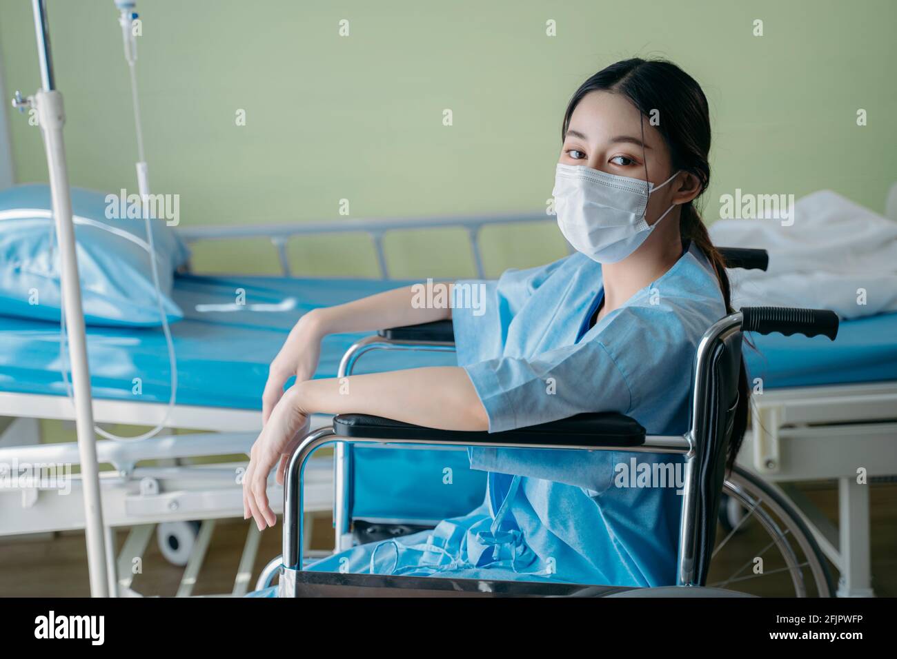 Portrait of Asian young handicapped woman with sad and hopeless feeling ...