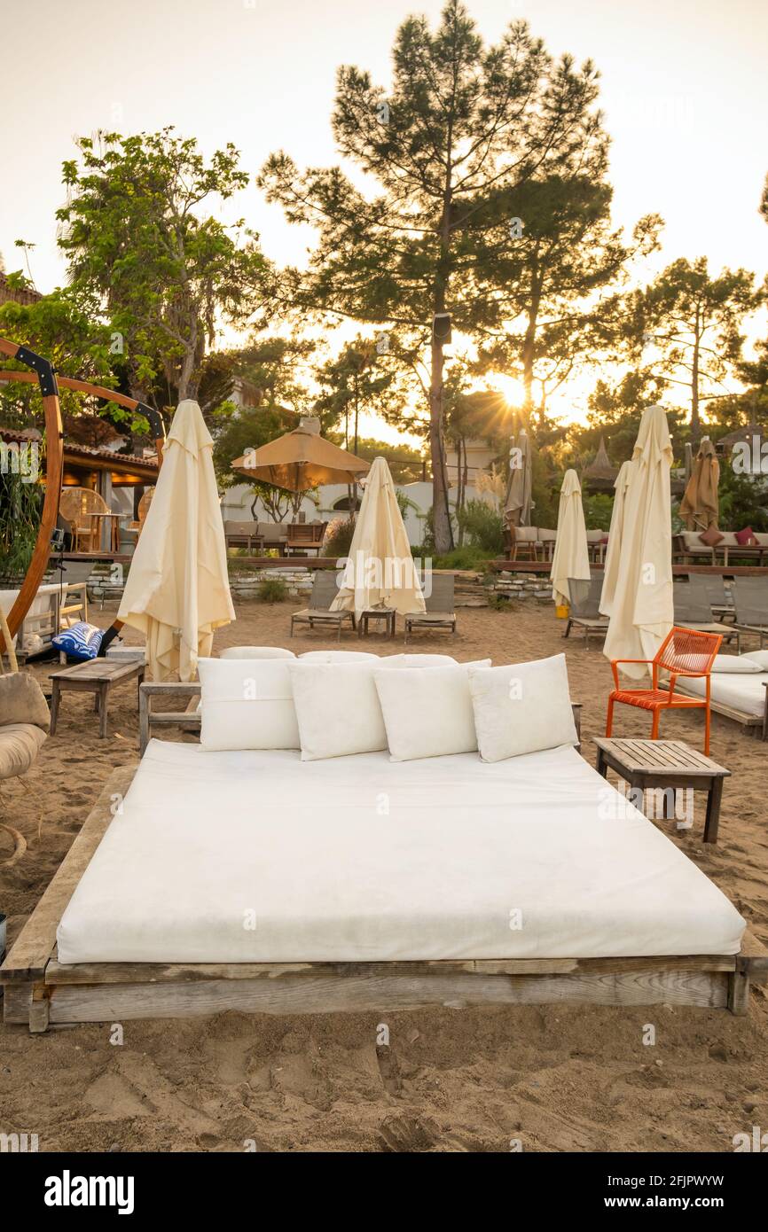 Big double bed on the beach in Kemer at sunset, Antalya, Turkey Stock ...