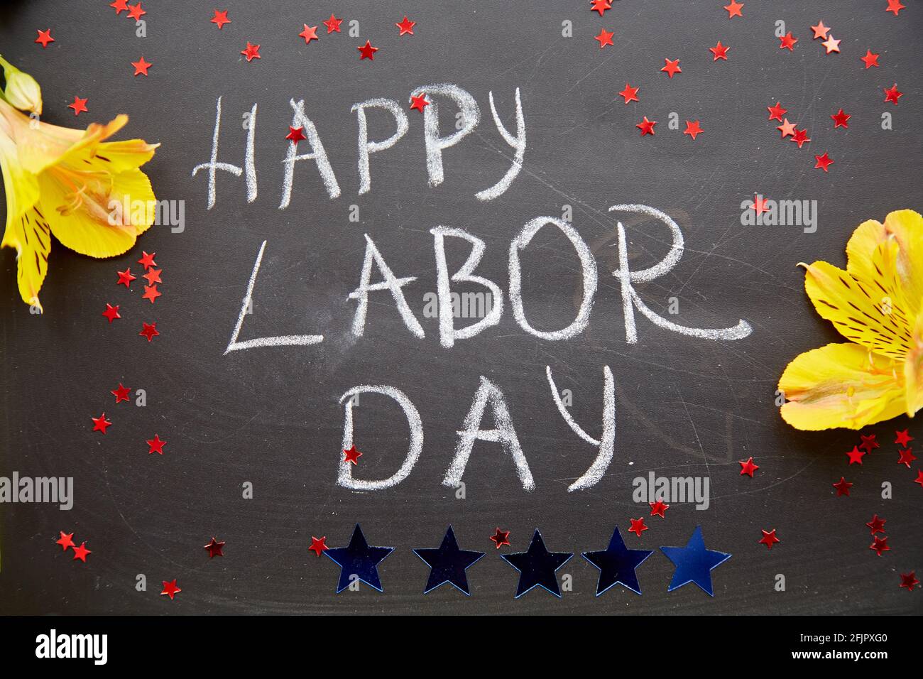 Happy labor day text with chalk on chalkboard close up. Festive ...
