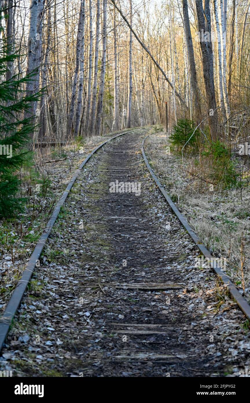 old railroad now working as walking path Stock Photo - Alamy