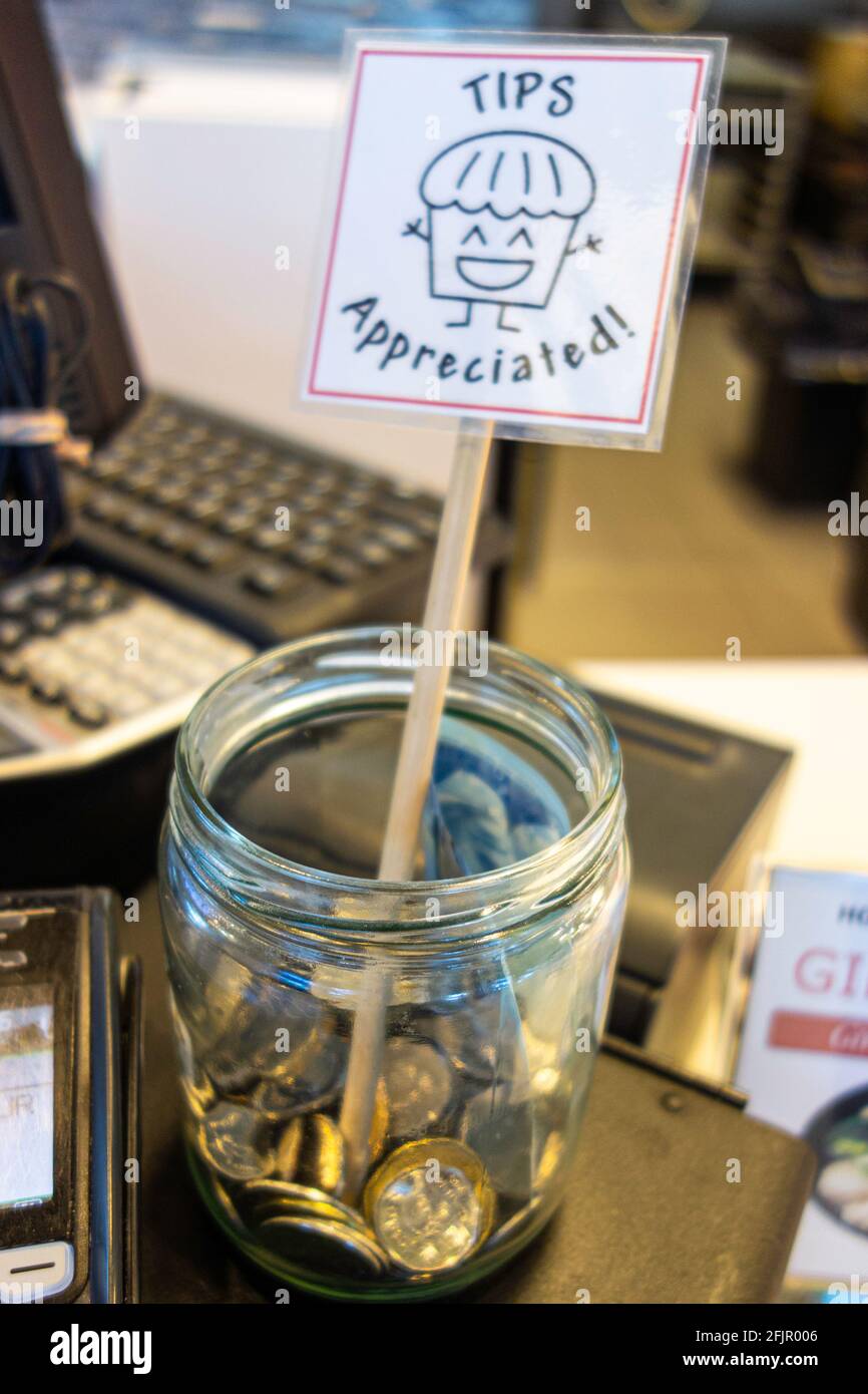 Restaurant tip jar hi-res stock photography and images - Alamy