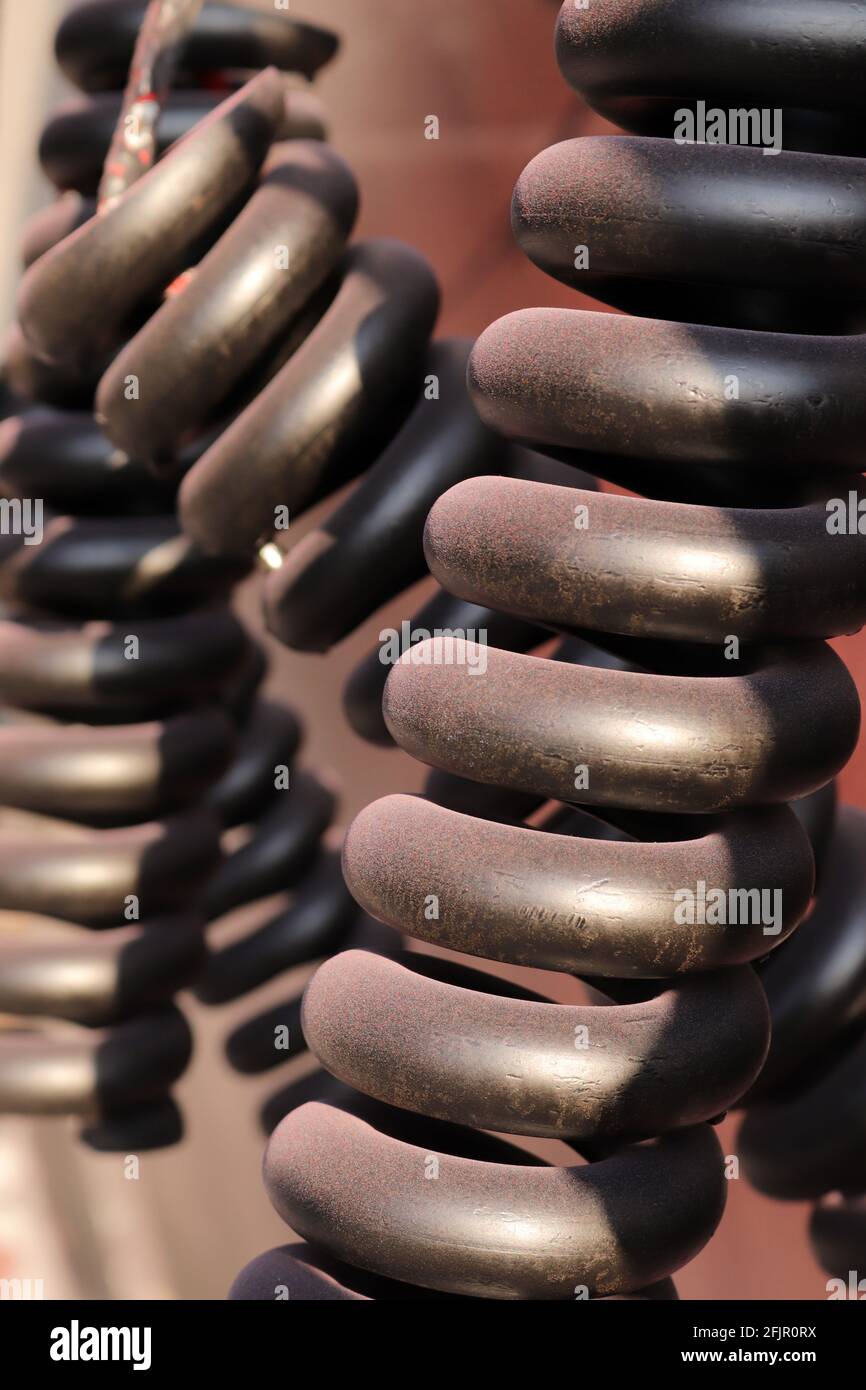Large steel spring background texture Stock Photo - Alamy