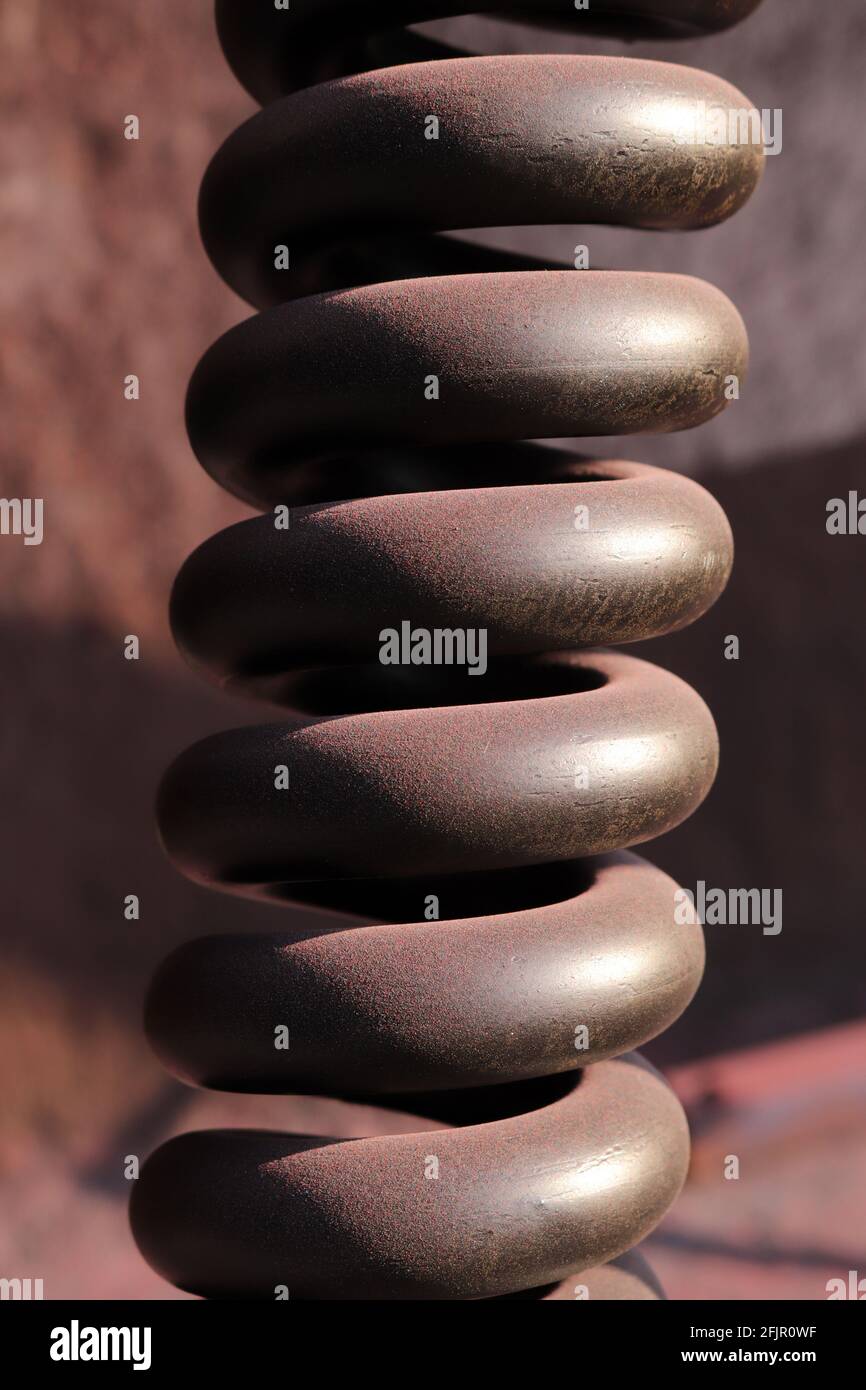 Large steel spring background texture Stock Photo - Alamy