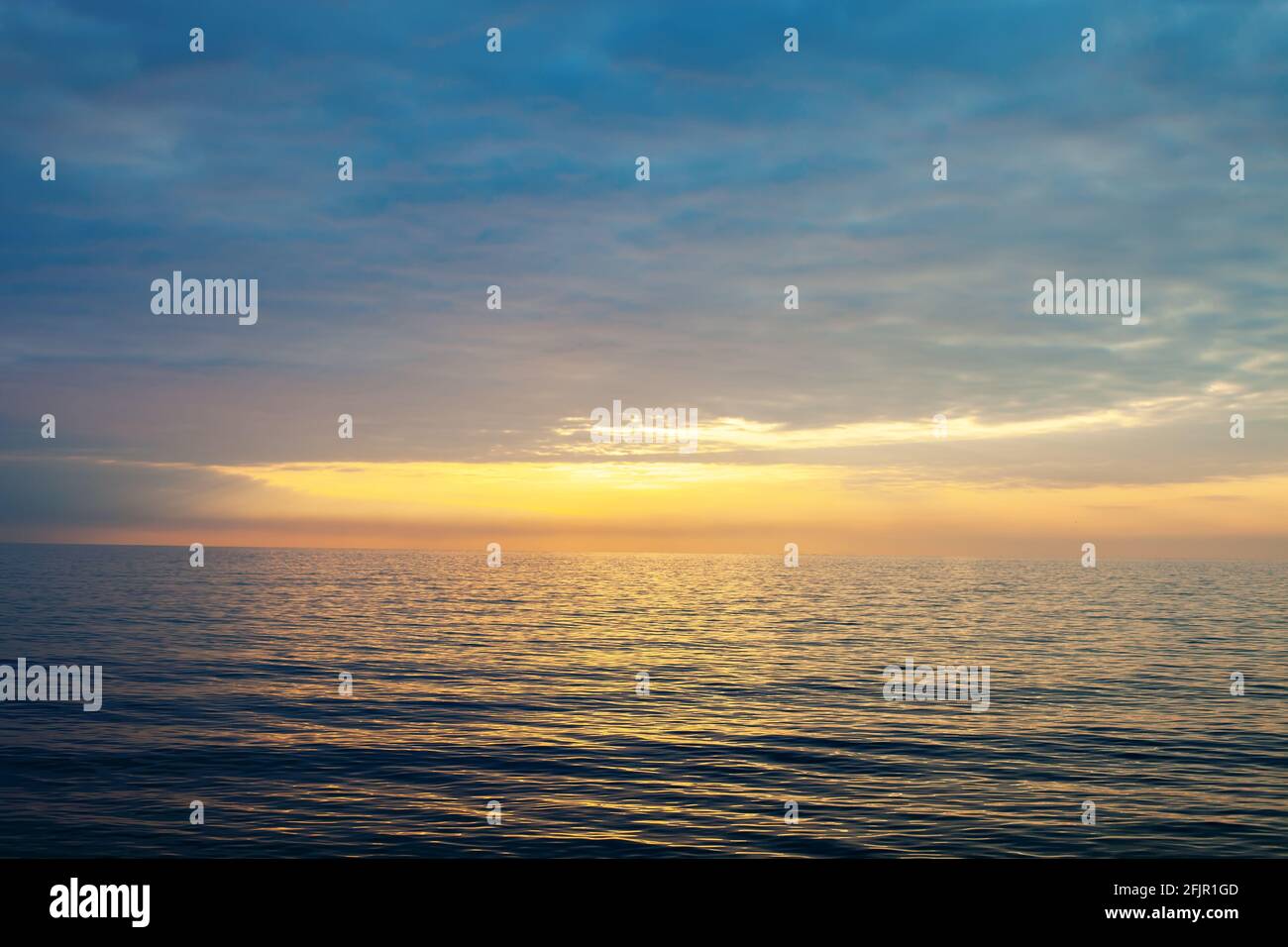 Amazing beach sunset with endless horizon. Horizontal. Selective focus ...